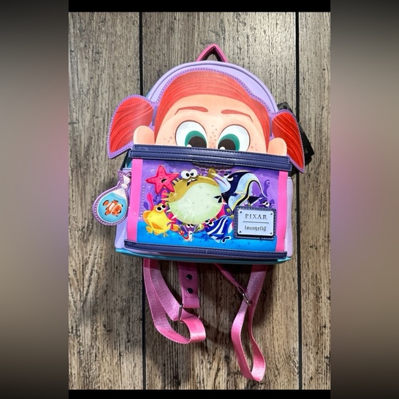 Loungefly | Bags | Loungefly Pixar Moments Finding Nemo Darla Mini ...